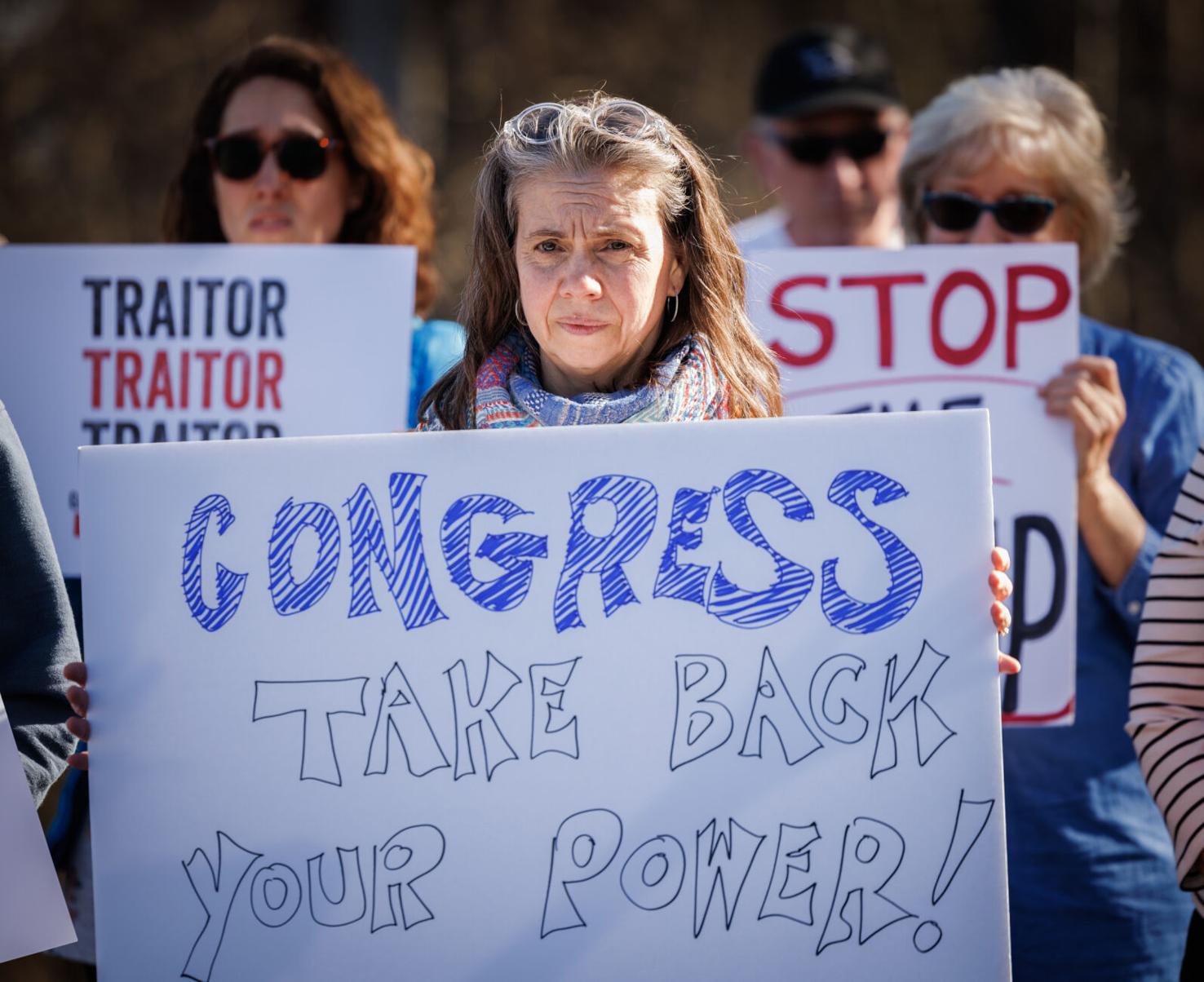 Demonstrators gather at Budd's office to protest Elon Musk
