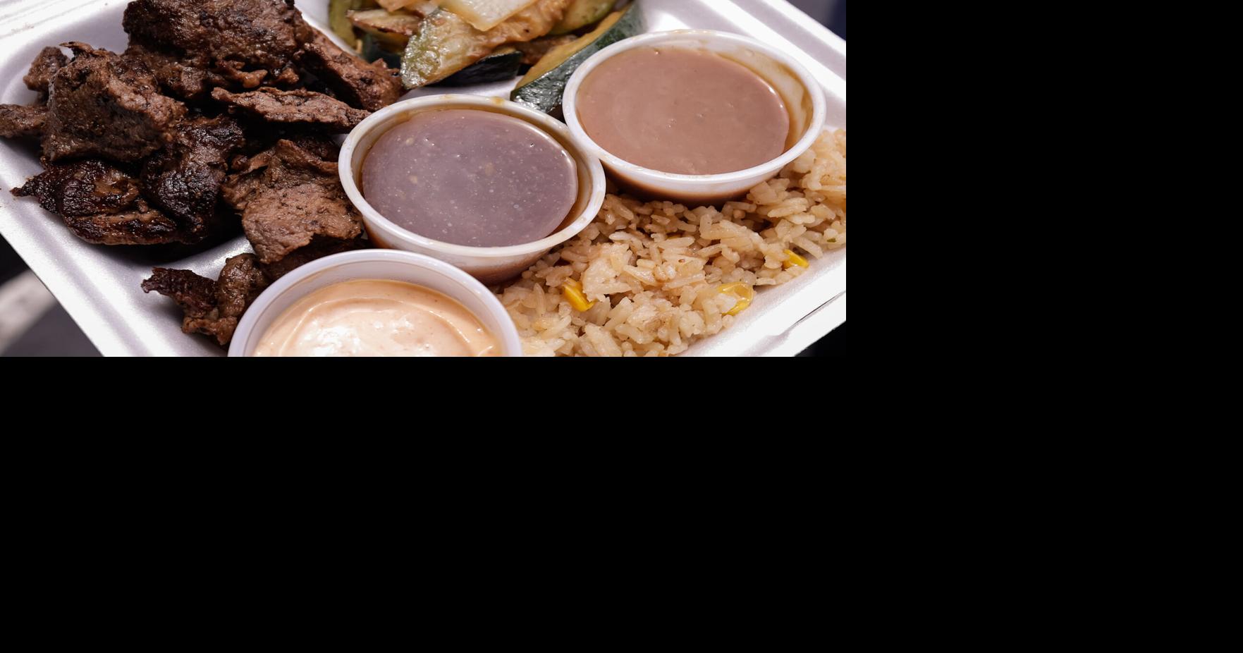 Aaron Shaver serves Asian fusion at Town Fork Mobile Kitchen