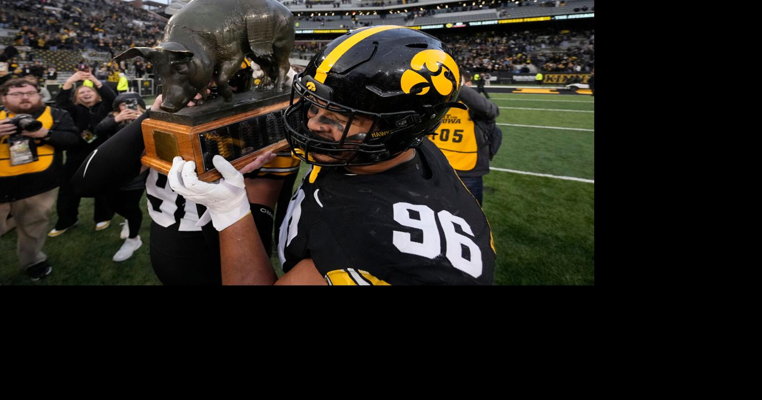 Meet the rivalry trophies of college football