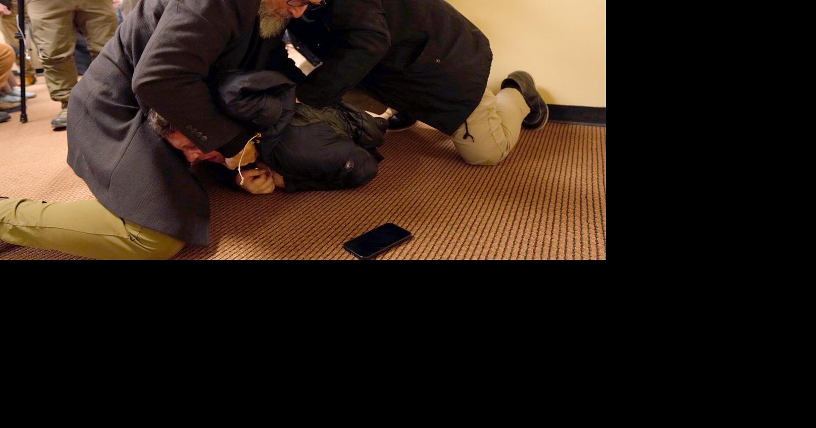 Rep. Ilhan Omar attached with spray in Minneapolis