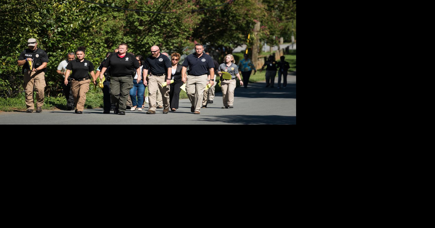 About 120 law enforcement officers and local residents knock on doors ...