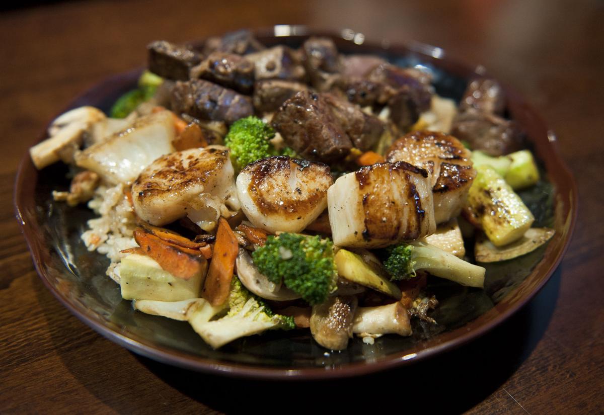 UMI Japanese restaurant opens off Hanes Mall Boulevard | Food ...