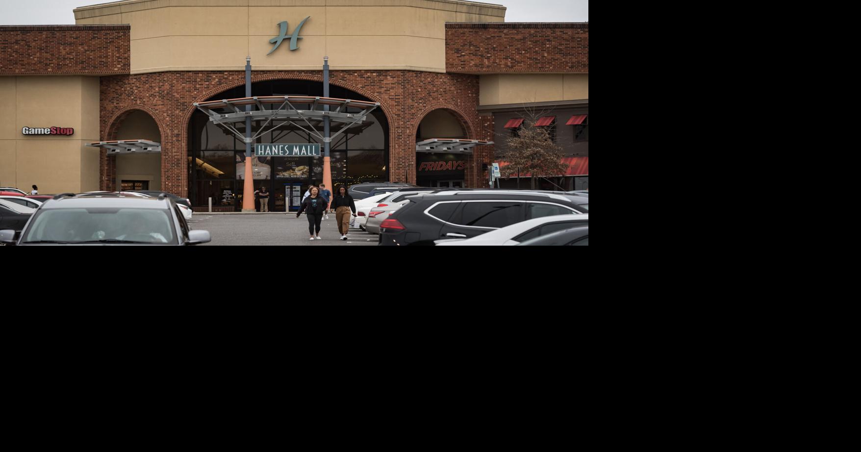 Hanes Mall owner reaches agreement to settle repayment dispute with ...