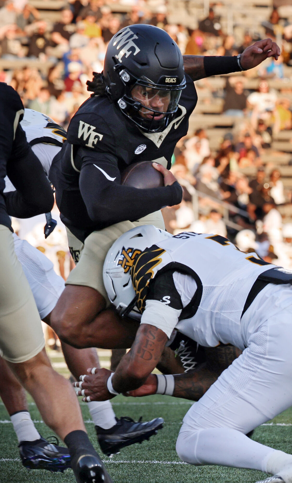 Wake Forest quarterback playing this season for late father