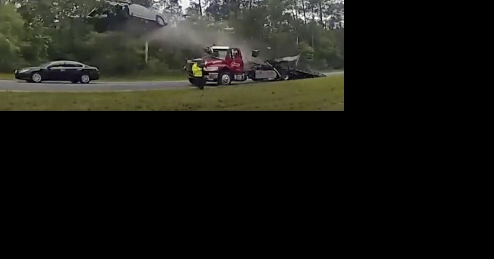 Driver whose car vaulted over tow truck says: 'I thought I was going to ...