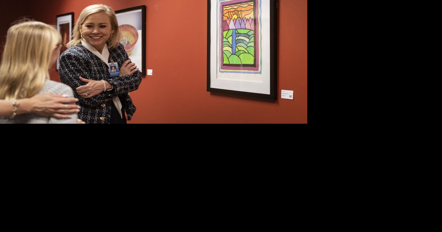 School superintendent unveils new work at reception