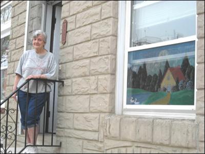 An Urban Legend: In a Baltimore tradition, window screens are adorned ...