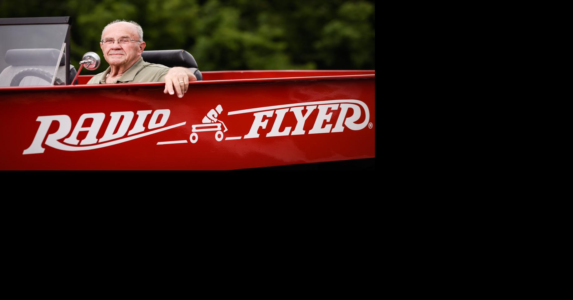 PHOTOS: Ed Ingle and his 15-foot-long drivable red wagon in Greensboro