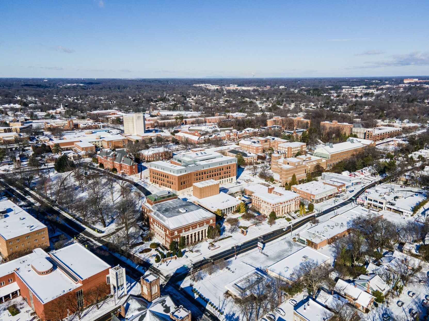 Greensboro digs out of snow and prepares for bitter cold: See the photos