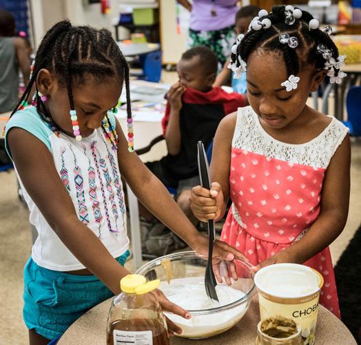 Students, staff at Cook Literacy School detail one-year progress