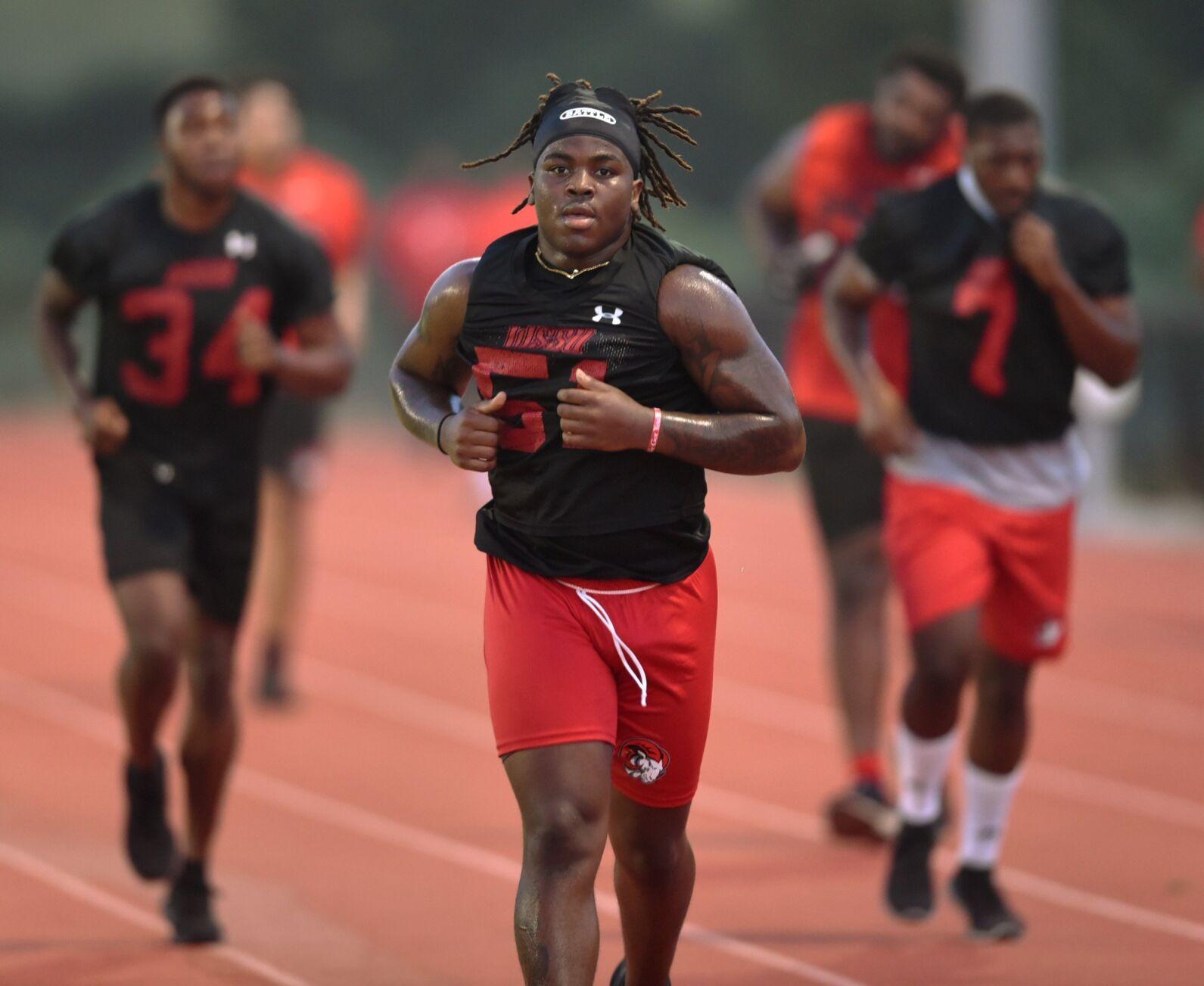 Dew sweepers: WSSU hits football practice field early Monday morning ...