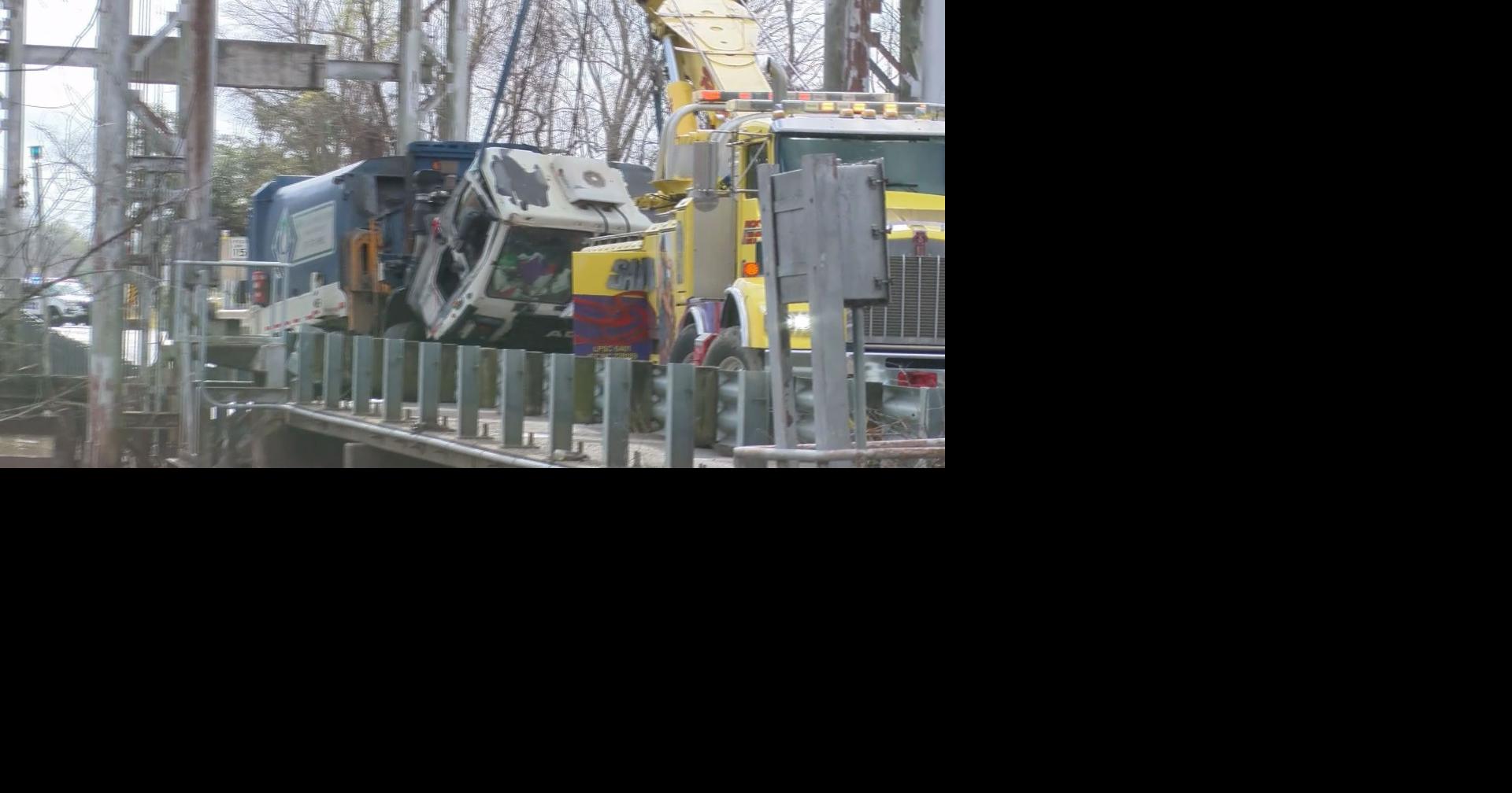 Garbage truck crash shuts down Estherwood Pontoon Bridge for hours ...