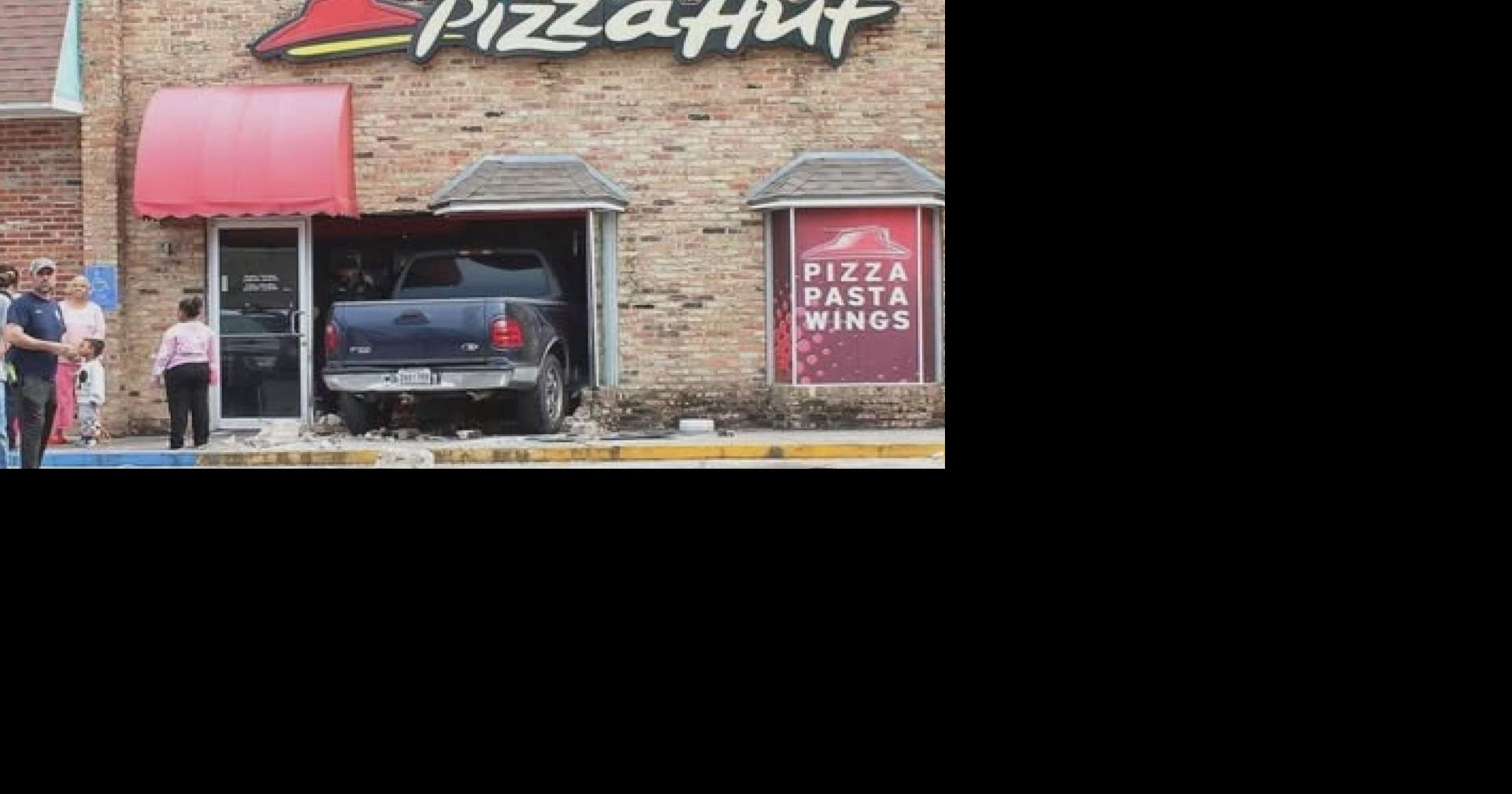 Truck plows into Rayne Pizza Hut after jumping curb | Video | kadn.com