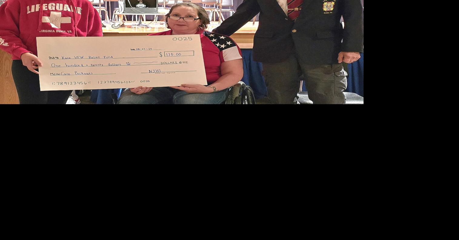 Kane Middle School National Junior Honor Society presents a check to ...