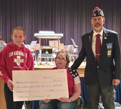 Kane Middle School National Junior Honor Society presents a check to ...