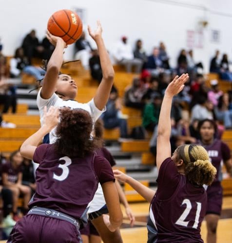 3rd straight win sends Lady Wolves into holiday break with sole ...