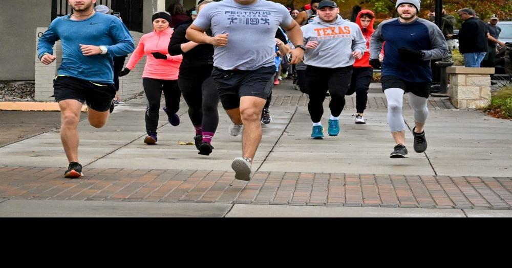 Going on a beer run: Runners brave cool temperature, moisture for ...