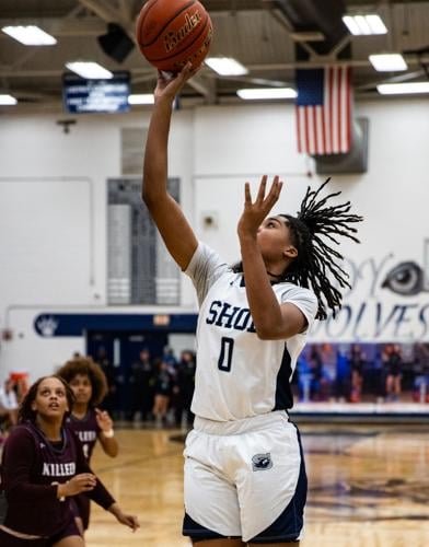 3rd straight win sends Lady Wolves into holiday break with sole ...