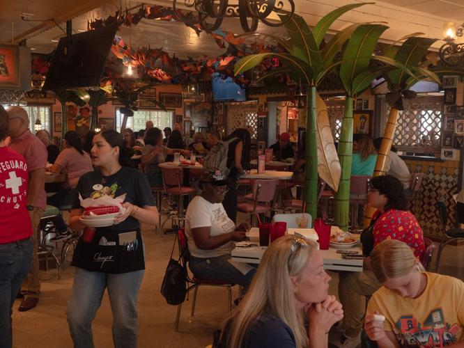 Inside the new Heights Chuy’s: Handcrafted palm trees, dog portraits ...
