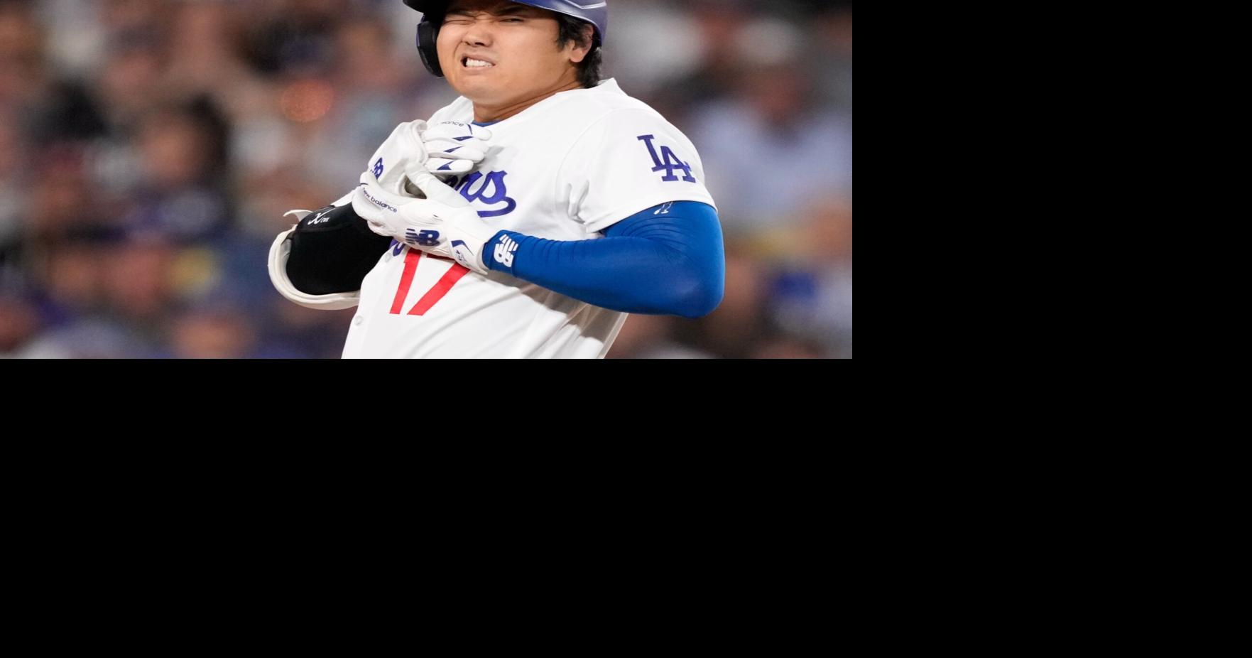 Dodgers' Shohei Ohtani hit on the hand by a pitch, exits game against ...