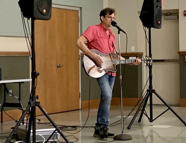 Singer Joe McDermott entertains children at Heights library | Community ...