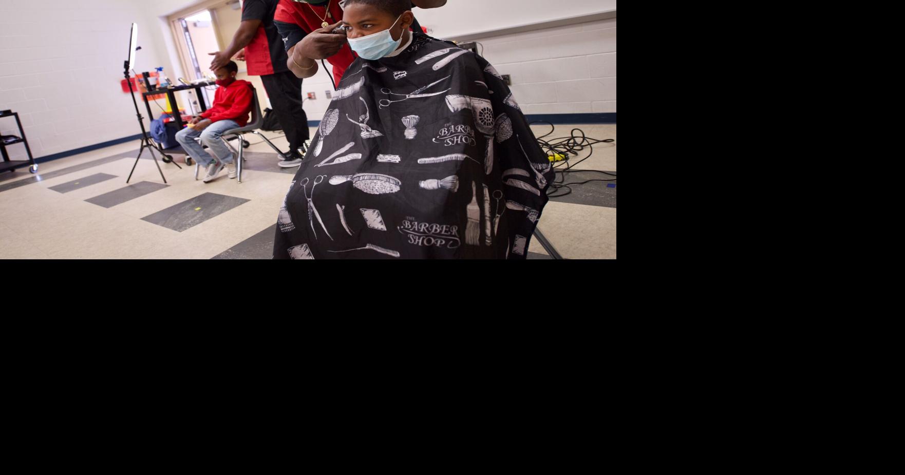 Barber school provides free haircuts for Ira Cross Elementary students ...