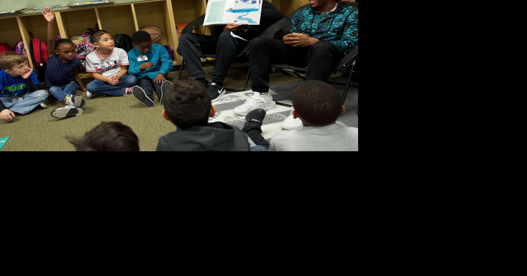 Ellison football players motivate elementary students through reading ...
