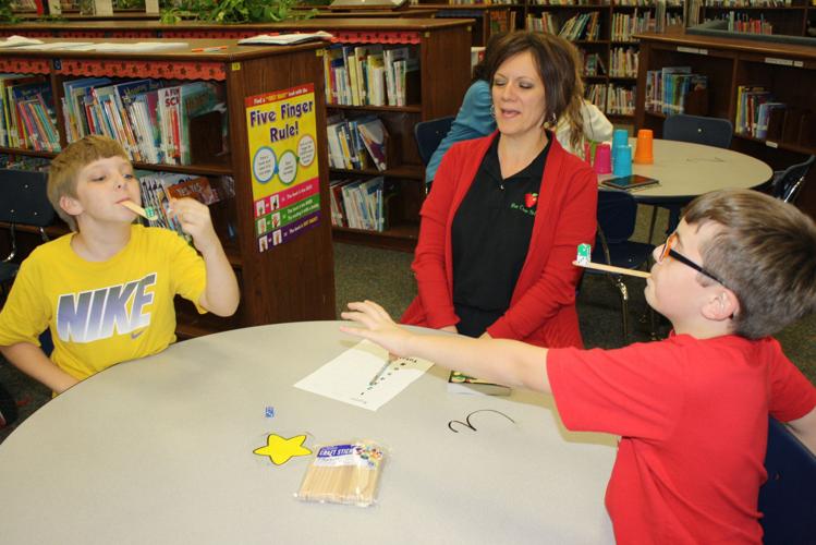 Puzzle-solving skills help students, families escape Cove school ...