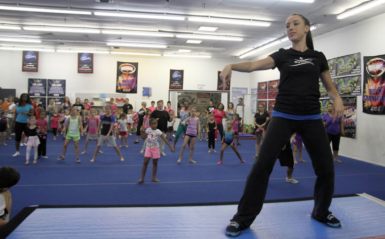 Scores of children and their parents help gym celebrate | Community ...