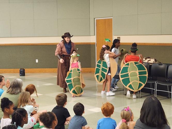 Ramblin’ Rita entertains, educates at Heights library | Community ...