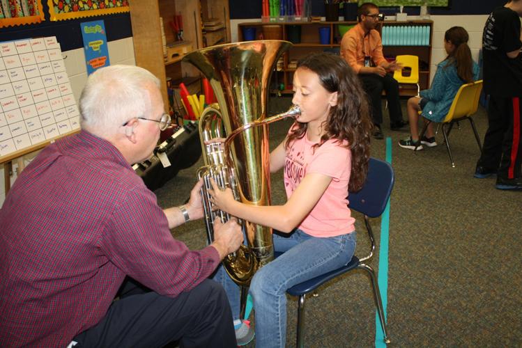 5th-grade students prepare to strike up junior high band | Education ...