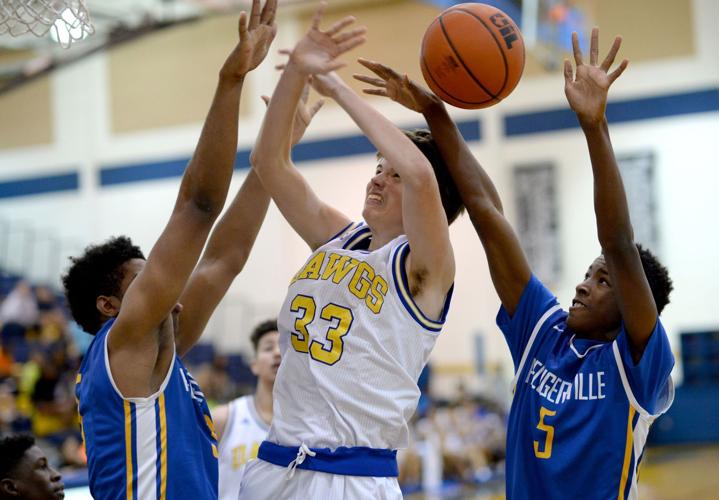 BOYS BASKETBALL: Second-half run sends Pflugerville past Cove ...