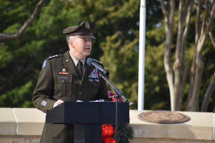 With smiles and tears, veterans and family members place thousands of ...