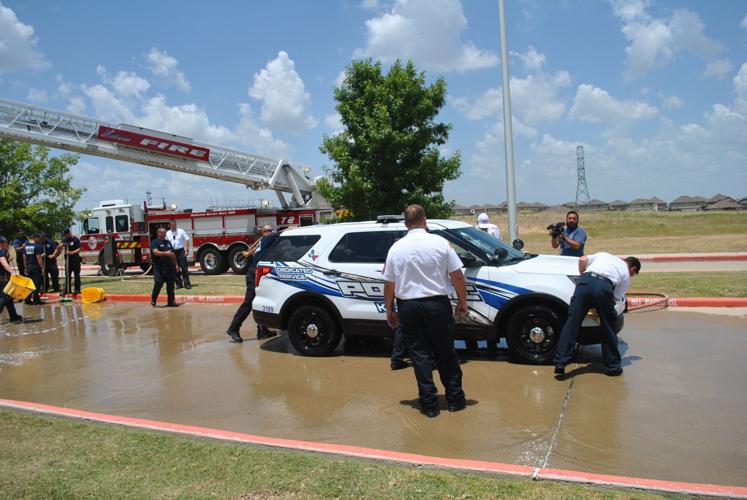 Police enjoy free car wash at hands of fire department | Local News ...