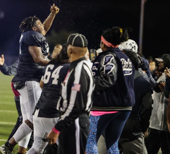 VICTORY FORMATION! Grey Wolves savor first win in nearly 3 years ...