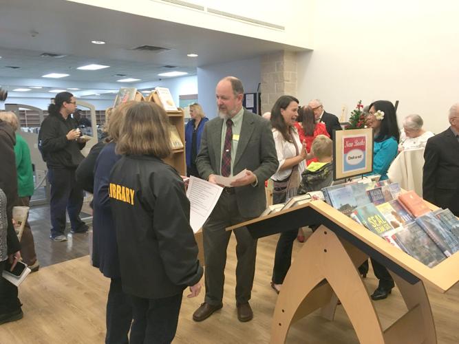 Library hosts ribbon-cutting to show off new, improved facility | News ...