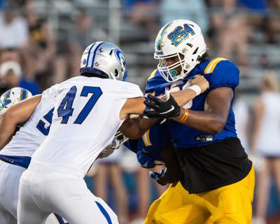 Cove’s Uini commits to SEC’s Georgia to continue football journey ...