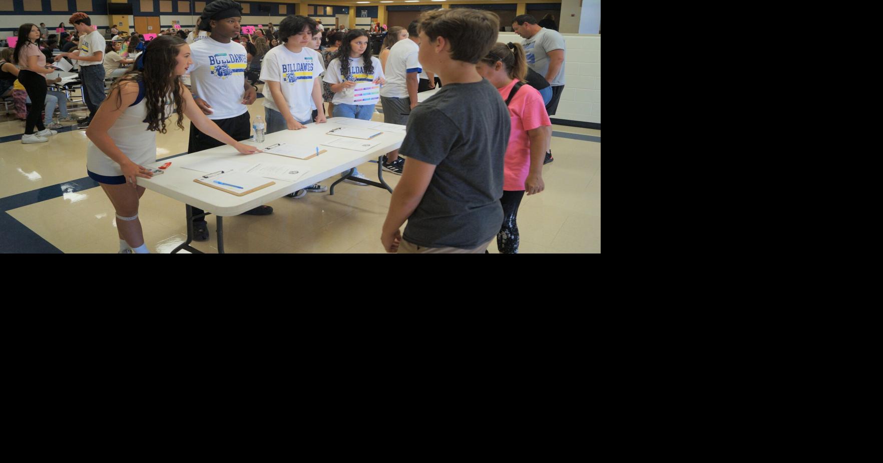 School officials welcome excited, nervous students at Cove High ...