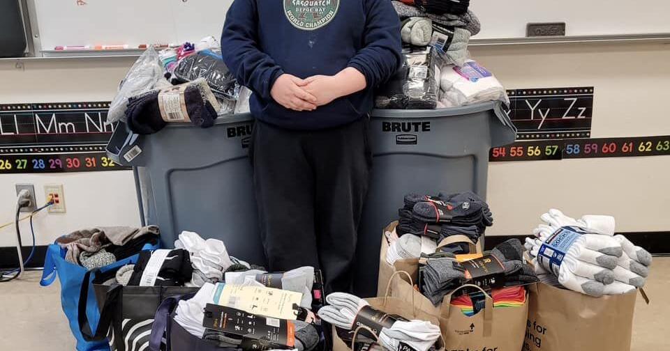 Local second grader collects almost 2,000 socks for people in need ...