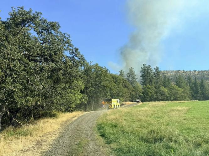 Forward progress of grassfire caused by a structure fire in Eagle Point ...
