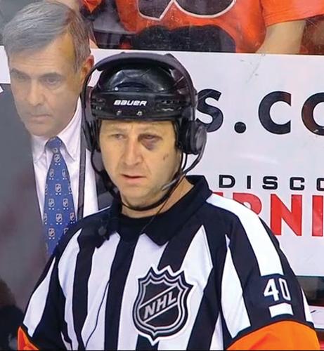Referee Steve Kozari taken off ice on stretcher after collision ...