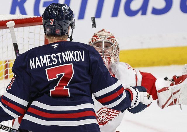 Red Wings score four times in third period to ground Jets 5-1 ...