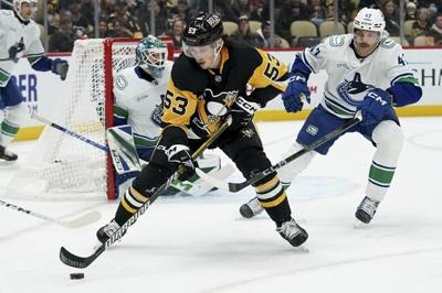 Rust helps Penguins beat Canucks 5-4 to snap three-game skid | National ...