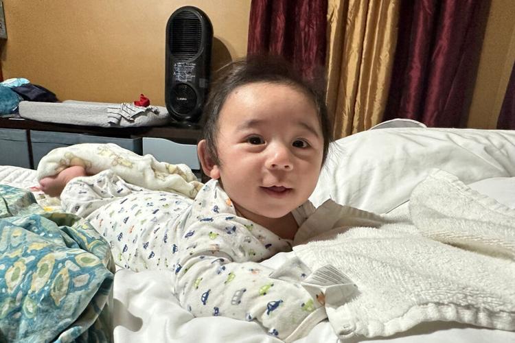 'The best gift ever': Baby is born after the rarest of pregnancies ...