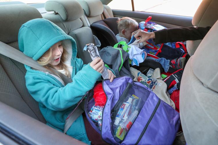 Backpack ministry packs them in at Oak Grove Baptist giveaway in Corbin ...