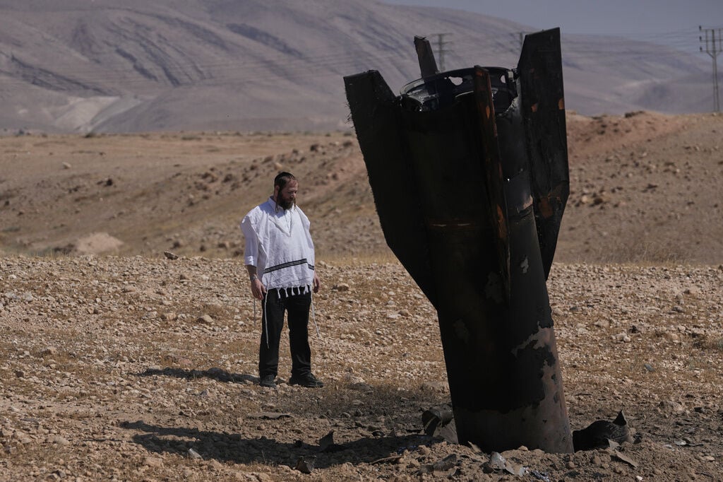 Israel and Iran trade strikes, threatening to drag the region back into ...