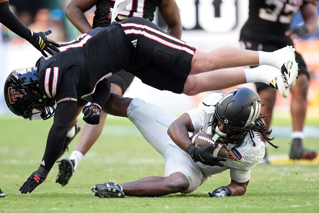 Defense carries the day for Oregon, as Ducks move into CFP semifinals ...