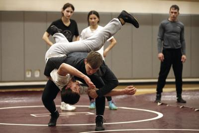 Collegiate wrestling star and coach visits Kayhi squad | Sports ...