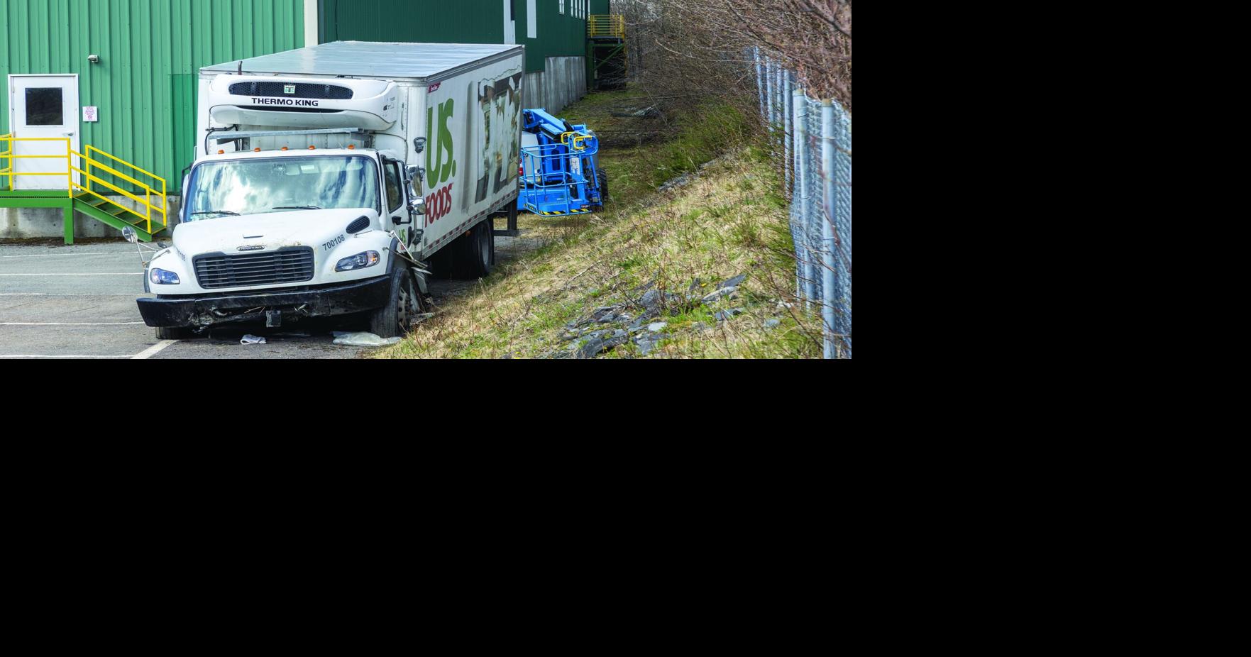 Commercial vehicle damages AMHS office building | Local News ...