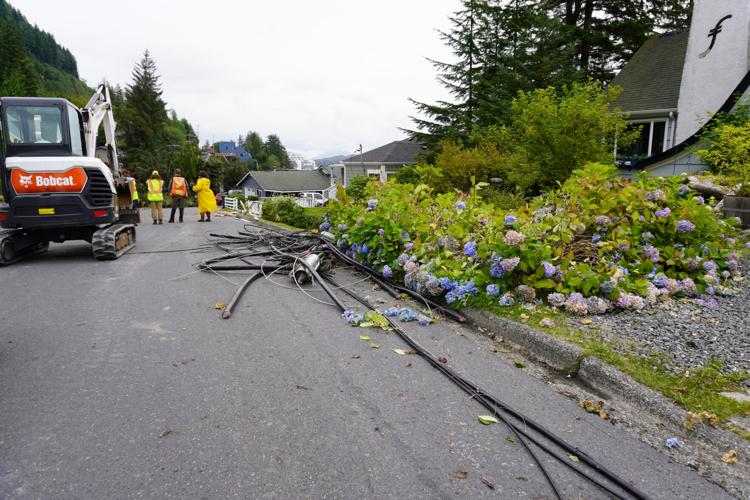 Landslide cleanup, site assessment work continues | Photos ...